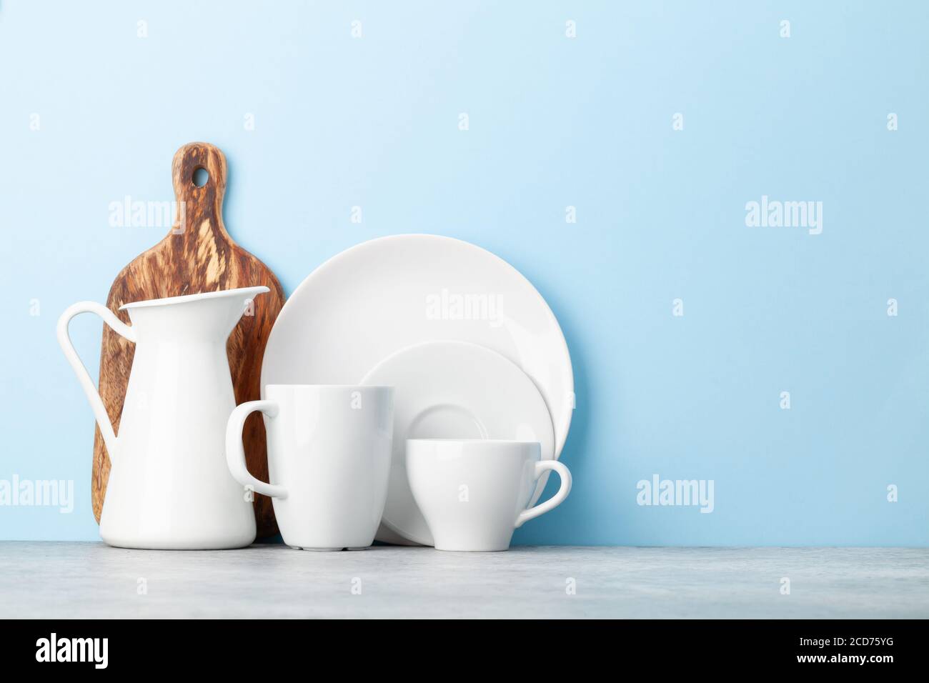 Kitchen utensils in front of blue background with copy space Stock ...