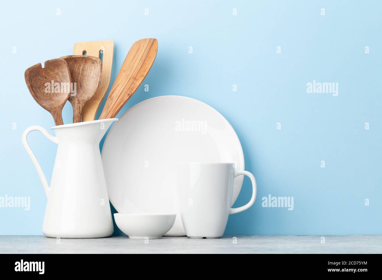 Kitchen utensils in front of blue background with copy space Stock ...
