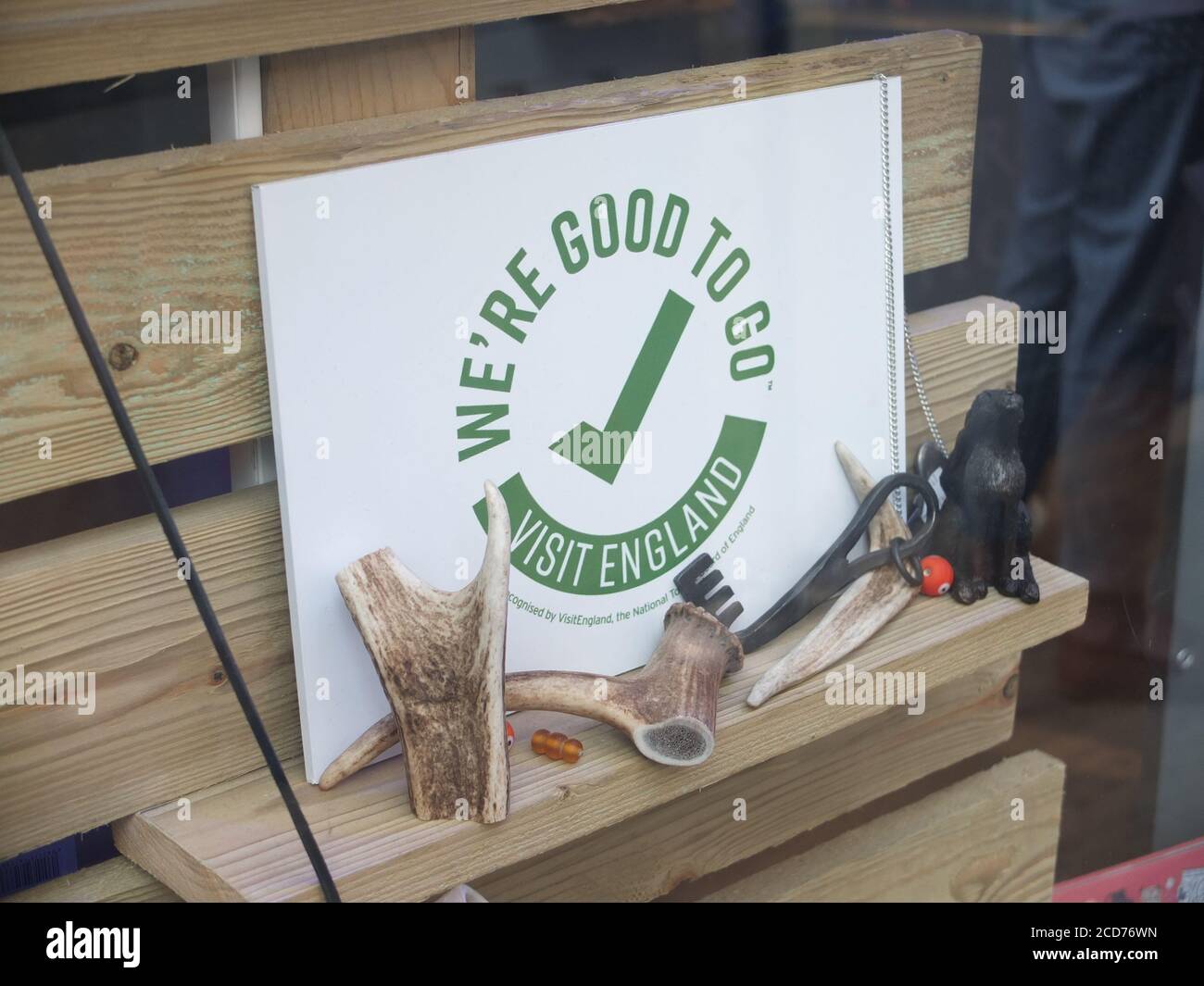 A 'We're Good To Go' tick sign from Visit England in the window of ...