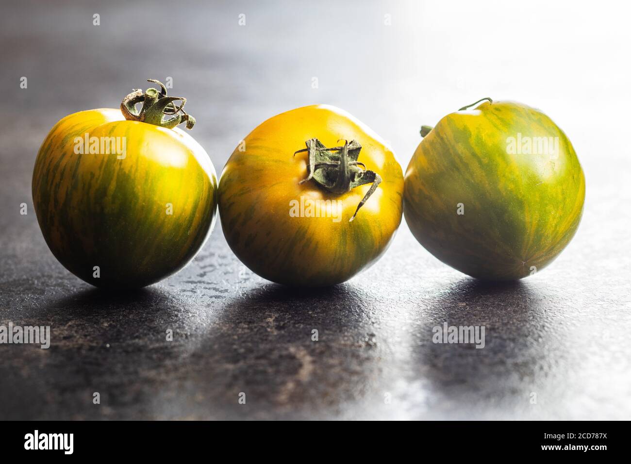 Green zebra tomato plant hi-res stock photography and images - Alamy