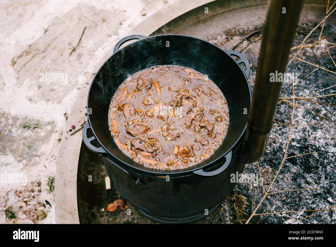 Cauldron boiling oil hi-res stock photography and images - Alamy