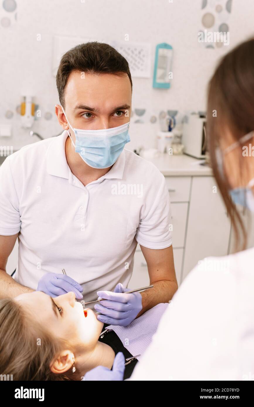 Nurse cleaning teeth hi-res stock photography and images - Alamy
