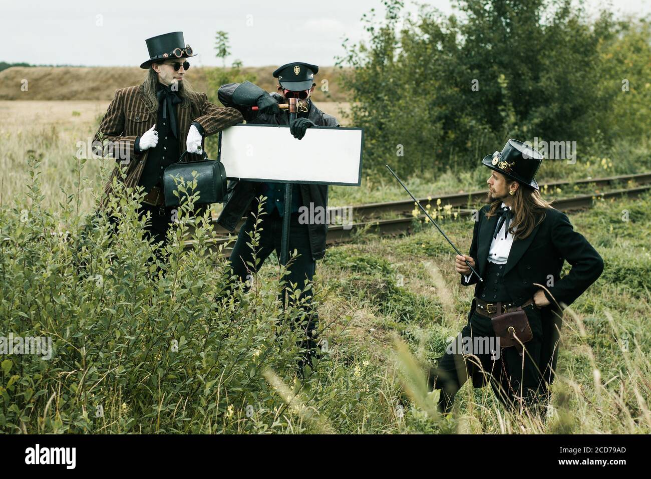 Three people in steampunk costume hi-res stock photography and images ...