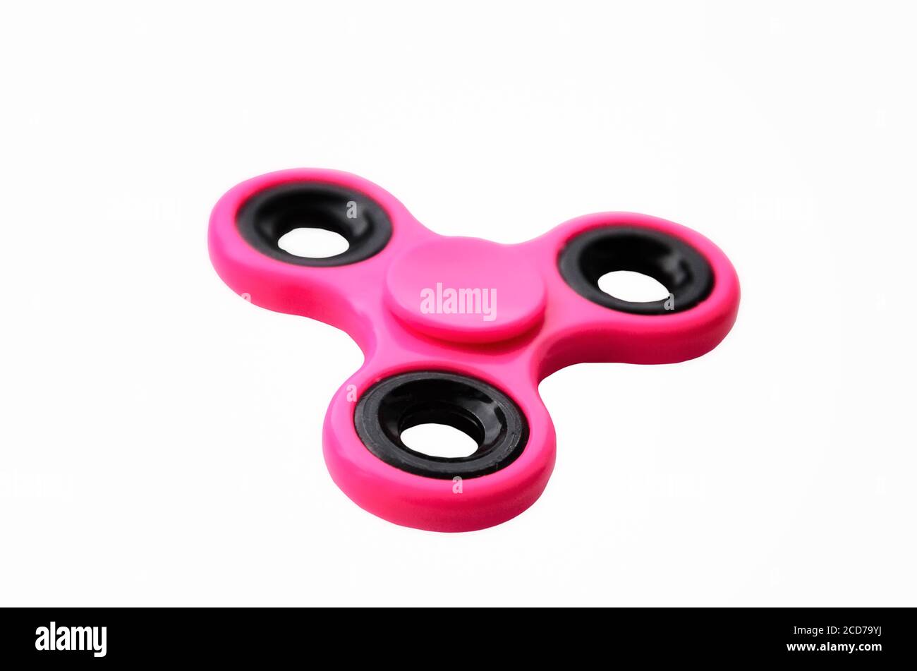 Pink spinner isolated on white Stock Photo - Alamy