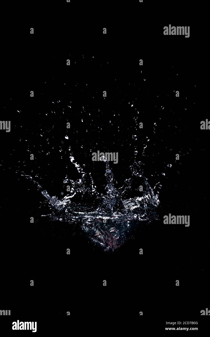 Water splash on black Stock Photo - Alamy
