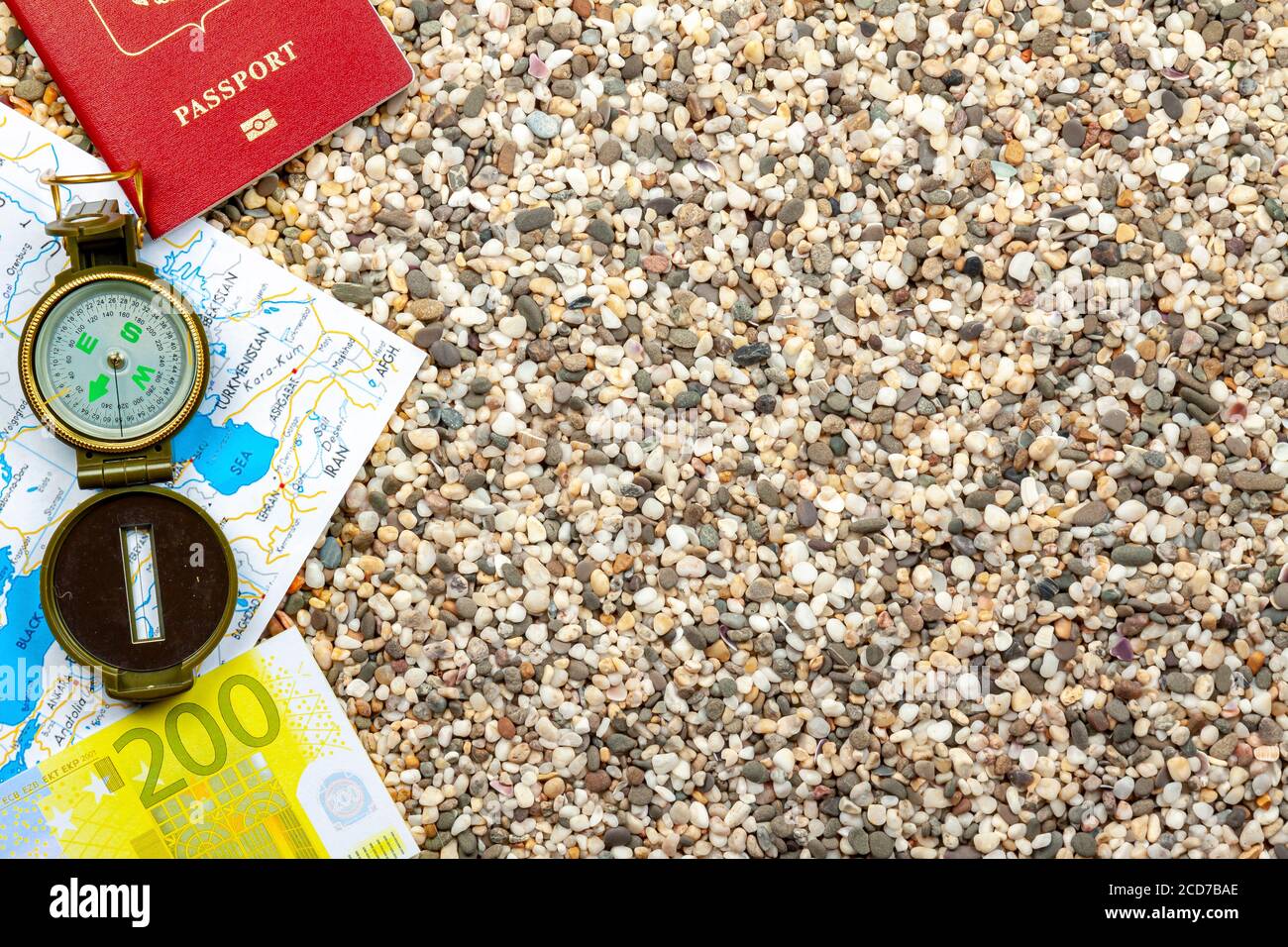 The theme of the journeys. Compass, passport, money, map, lie on a ...