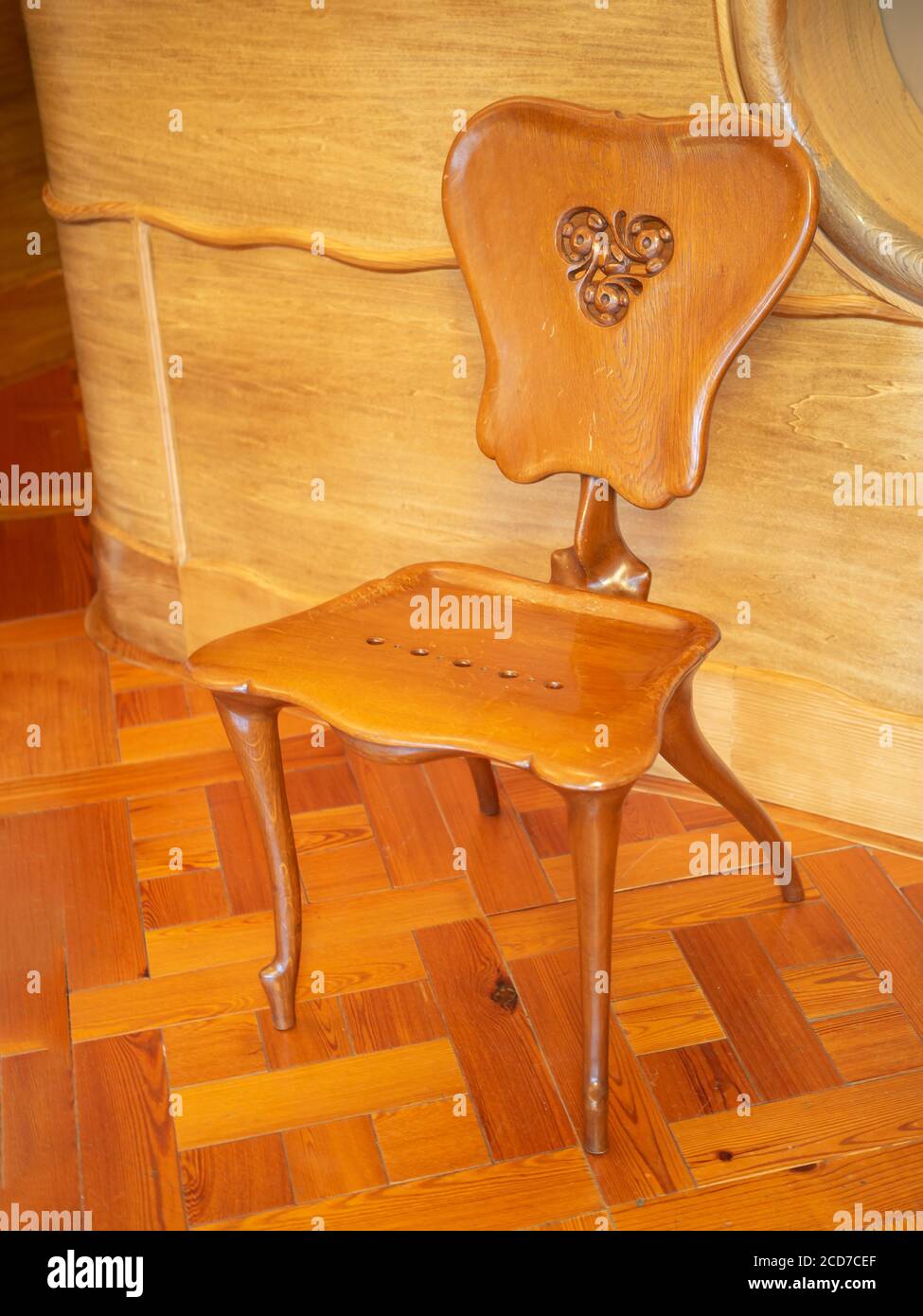 BARCELONA, SPAIN-JULY 16, 2020: Wooden chair designed by Antoni Gaudi ...