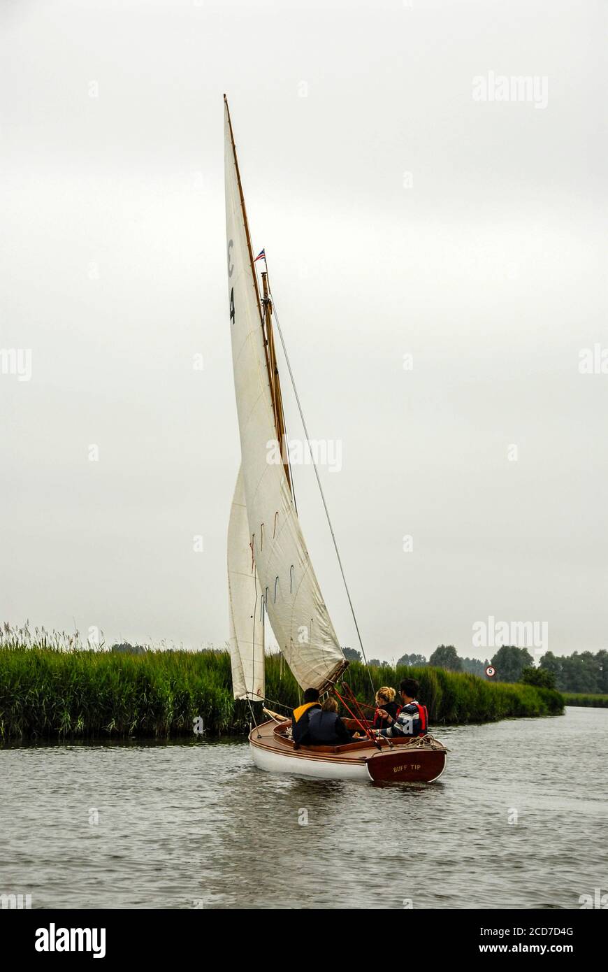 A traditional wooden sailing boat on the River Thurne in the Norfolk ...