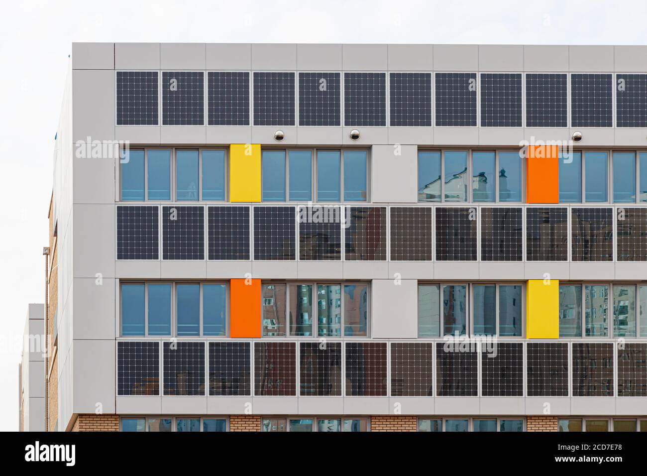 Building solar panels. Solar elementary school building. Eco-friendly ...