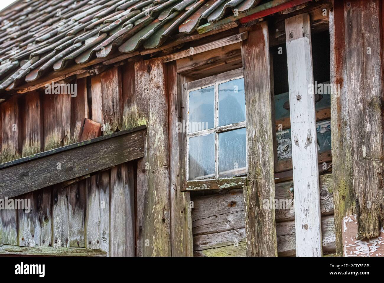 Small window on an old abandoned house Stock Photo - Alamy