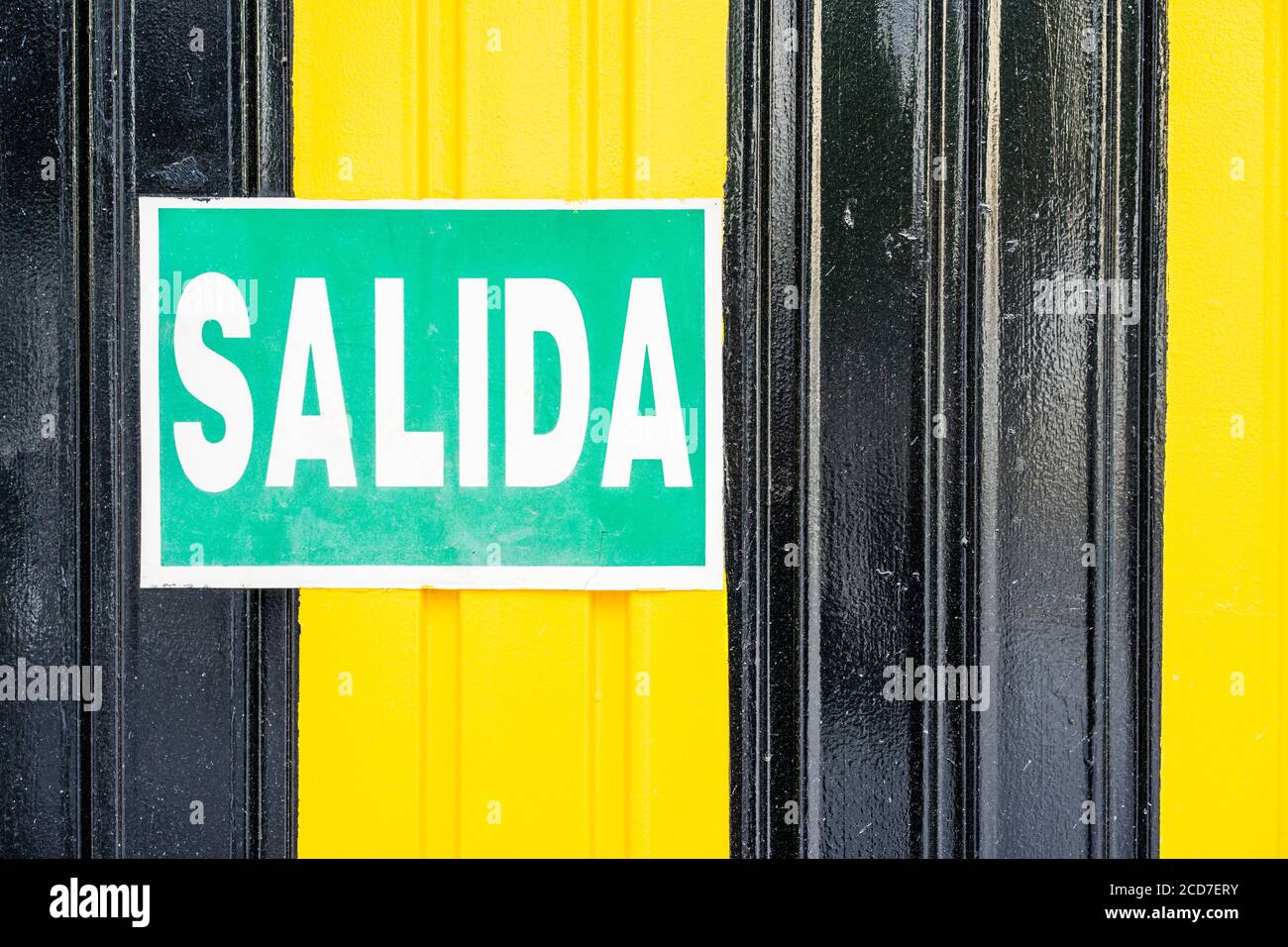 Signboard "Salida-Exit" on painted wooden planks Stock Photo - Alamy