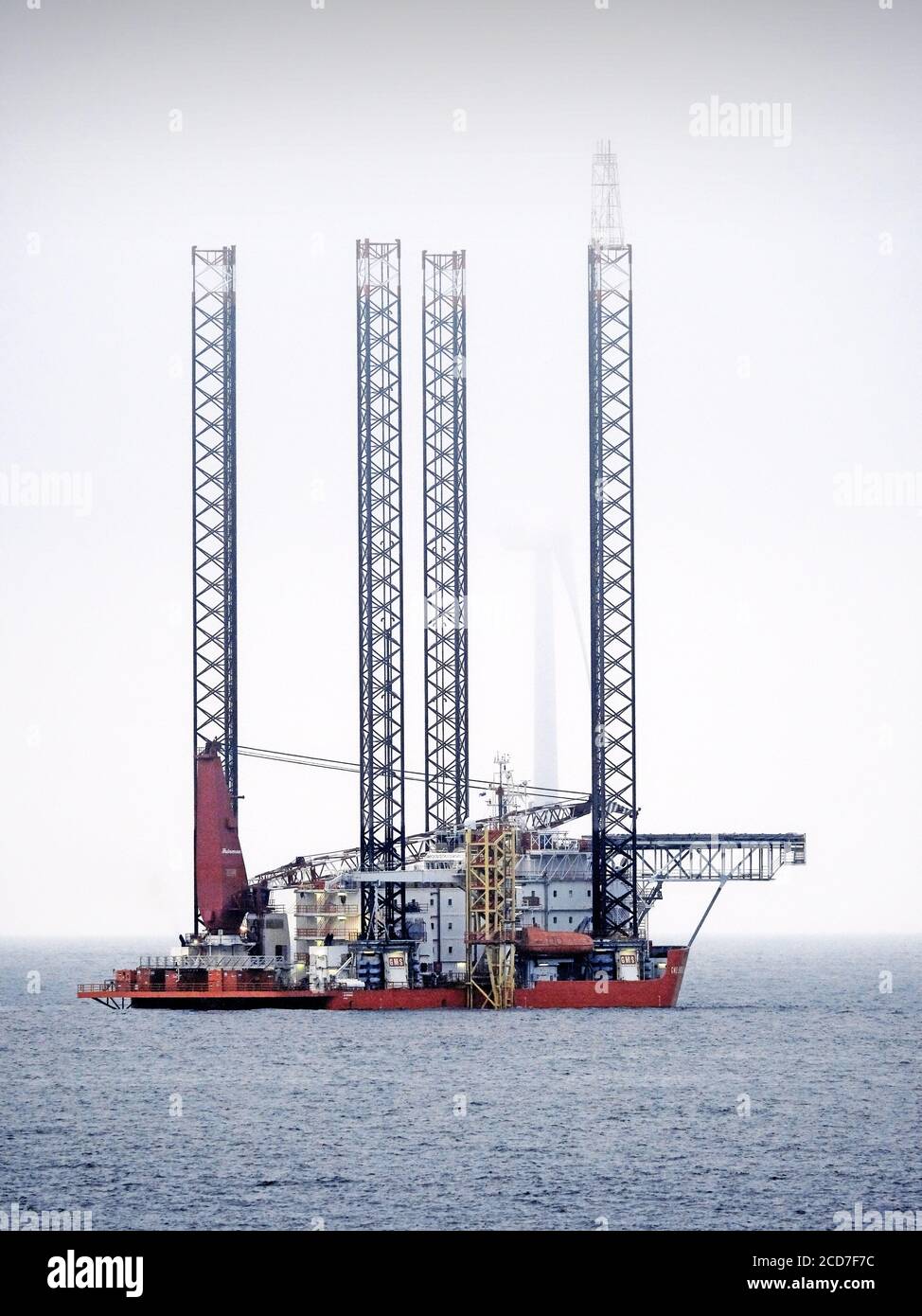 Jack up rig GMS Endeavour and a wind turbine just visible in the North ...