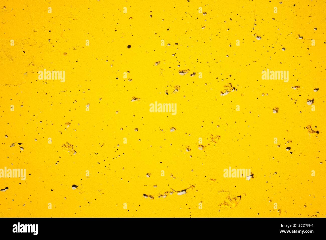 Yellow damaged wall texture Stock Photo - Alamy
