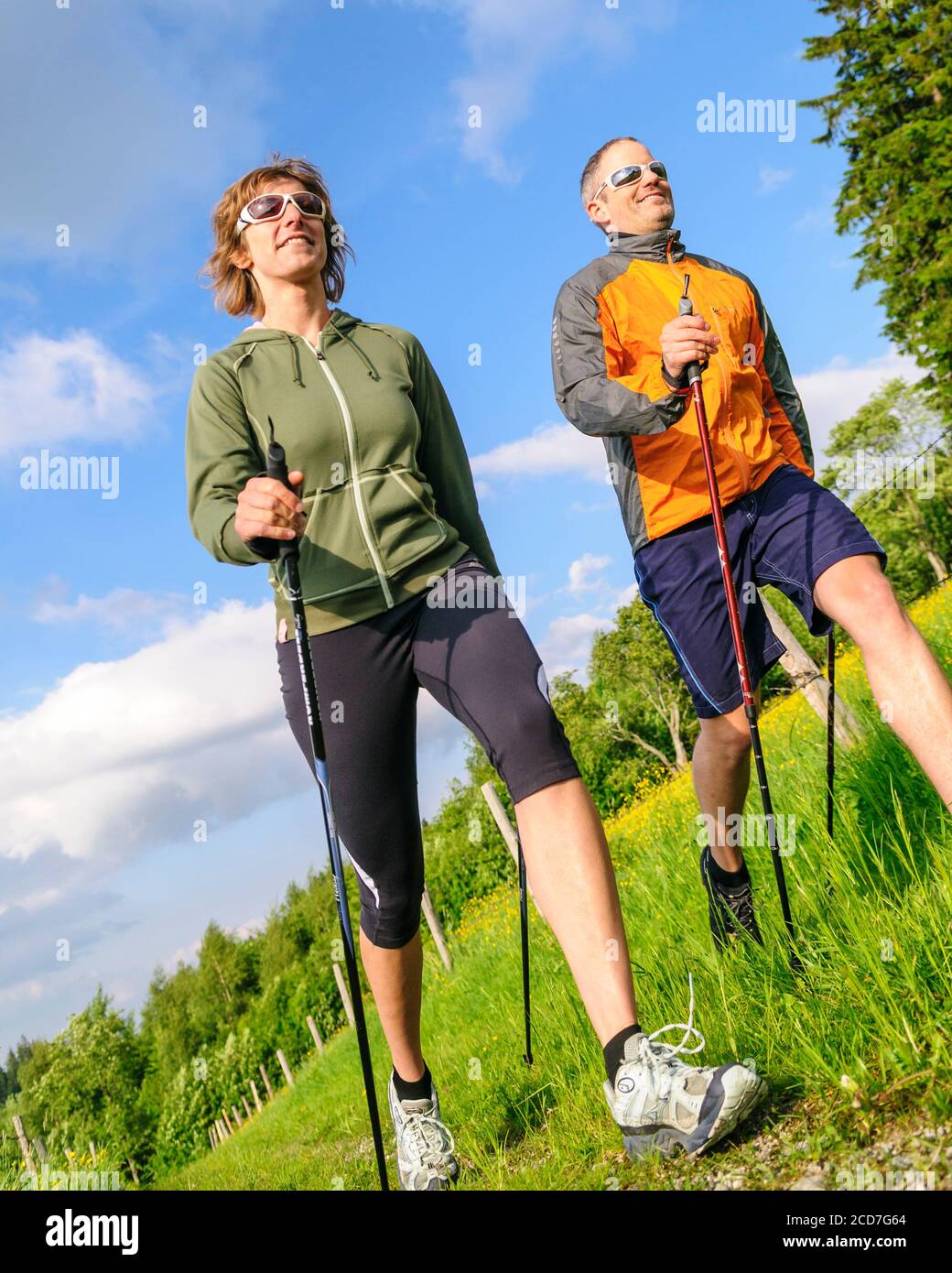 Couple doing nordic walking exercise Stock Photo - Alamy