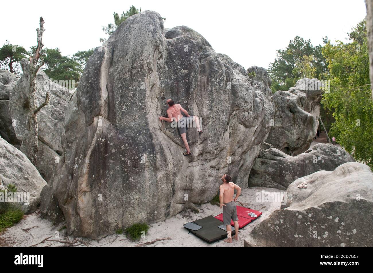 Bouldering at the rocks in the forests of Fontainebleau Stock Photo - Alamy