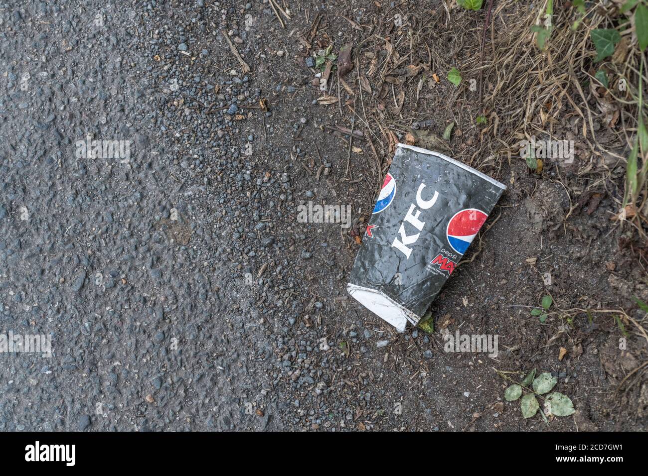 KFC takeaway drinks cup (believed to be paper) on the side of a country ...