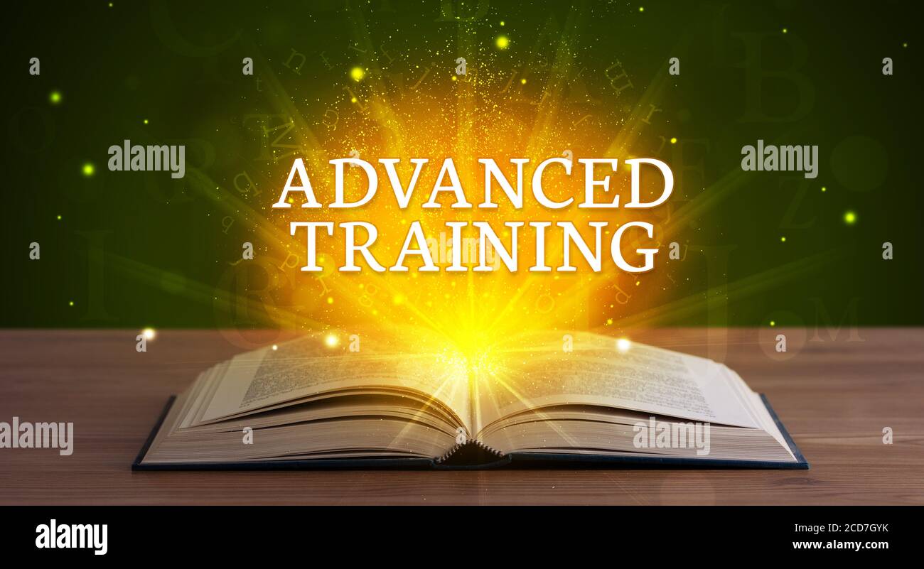 ADVANCED TRAINING inscription coming out from an open book, educational ...