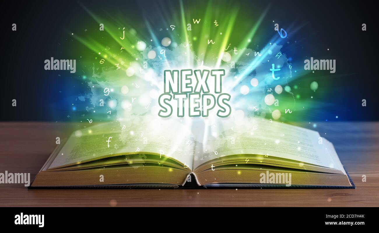 NEXT STEPS inscription coming out from an open book, educational ...