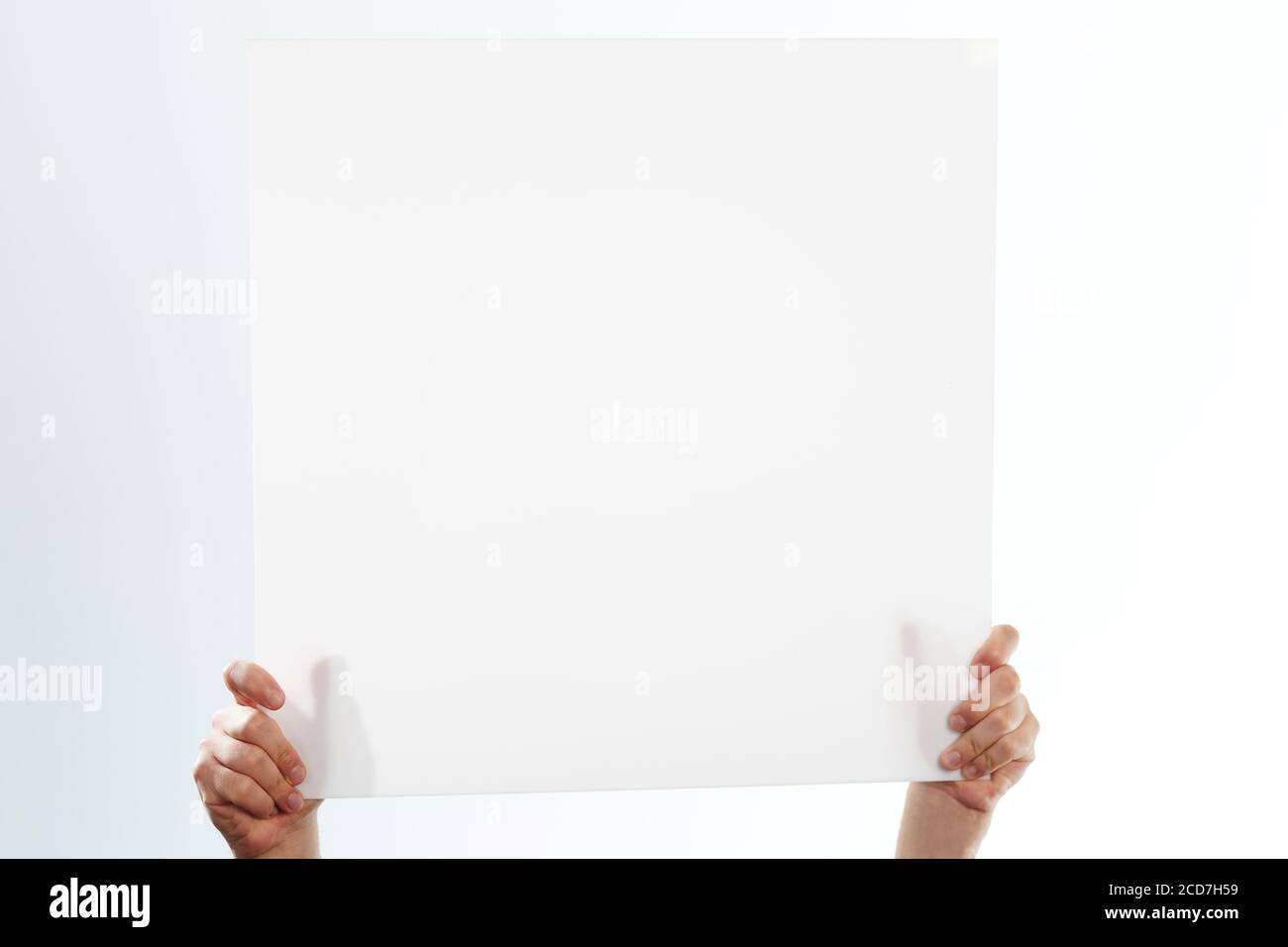 Hand hold empty sign board isolated on white studio background Stock ...