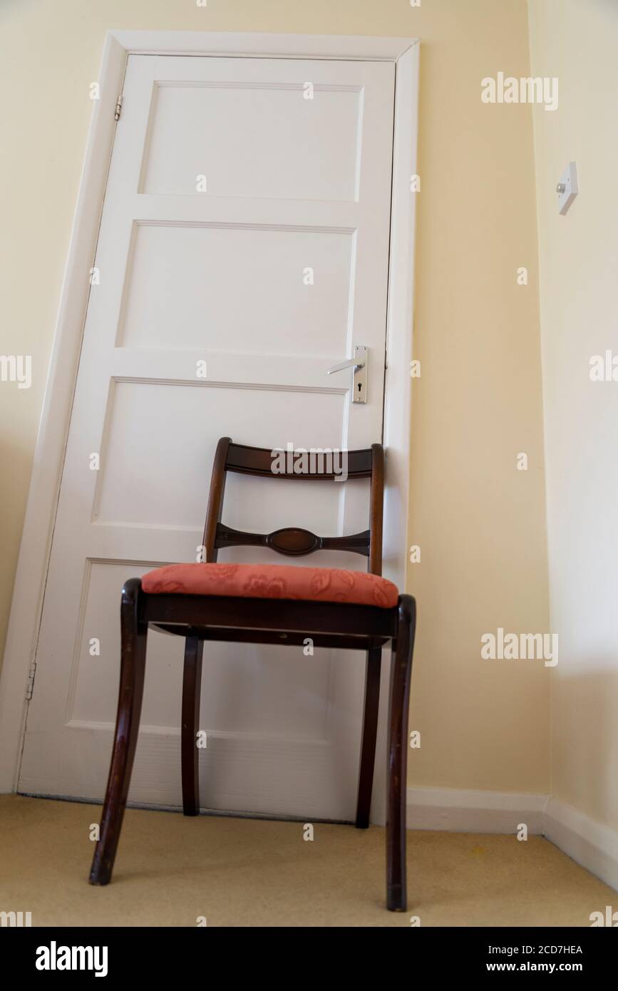 Dining chair Holding a Door Shut in a bedroom in a suburban house ...