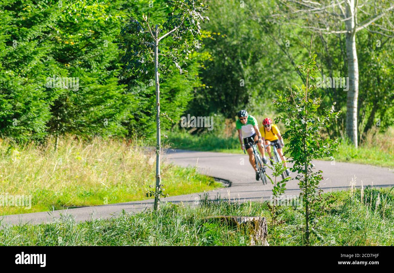 Cyclists in nature with race bike Stock Photo - Alamy