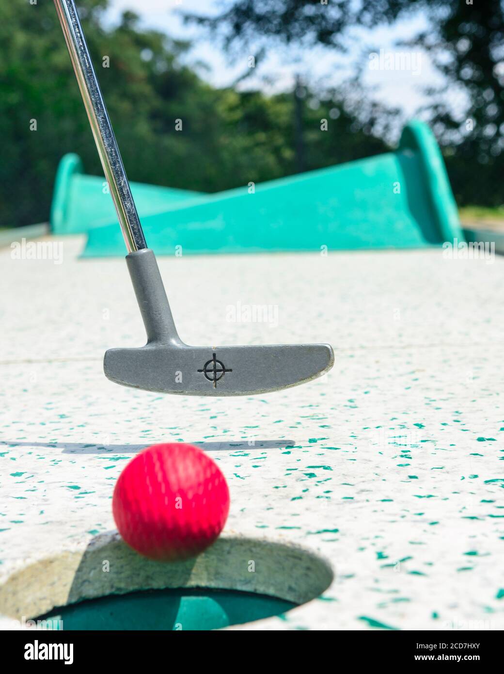 playing miniature golf Stock Photo - Alamy