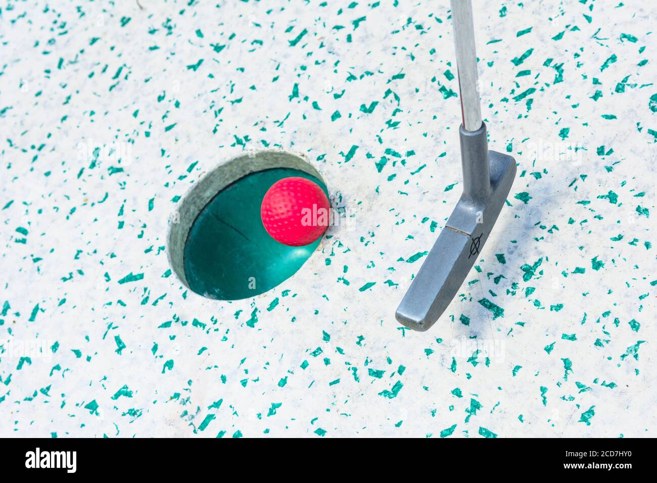 playing miniature golf Stock Photo - Alamy