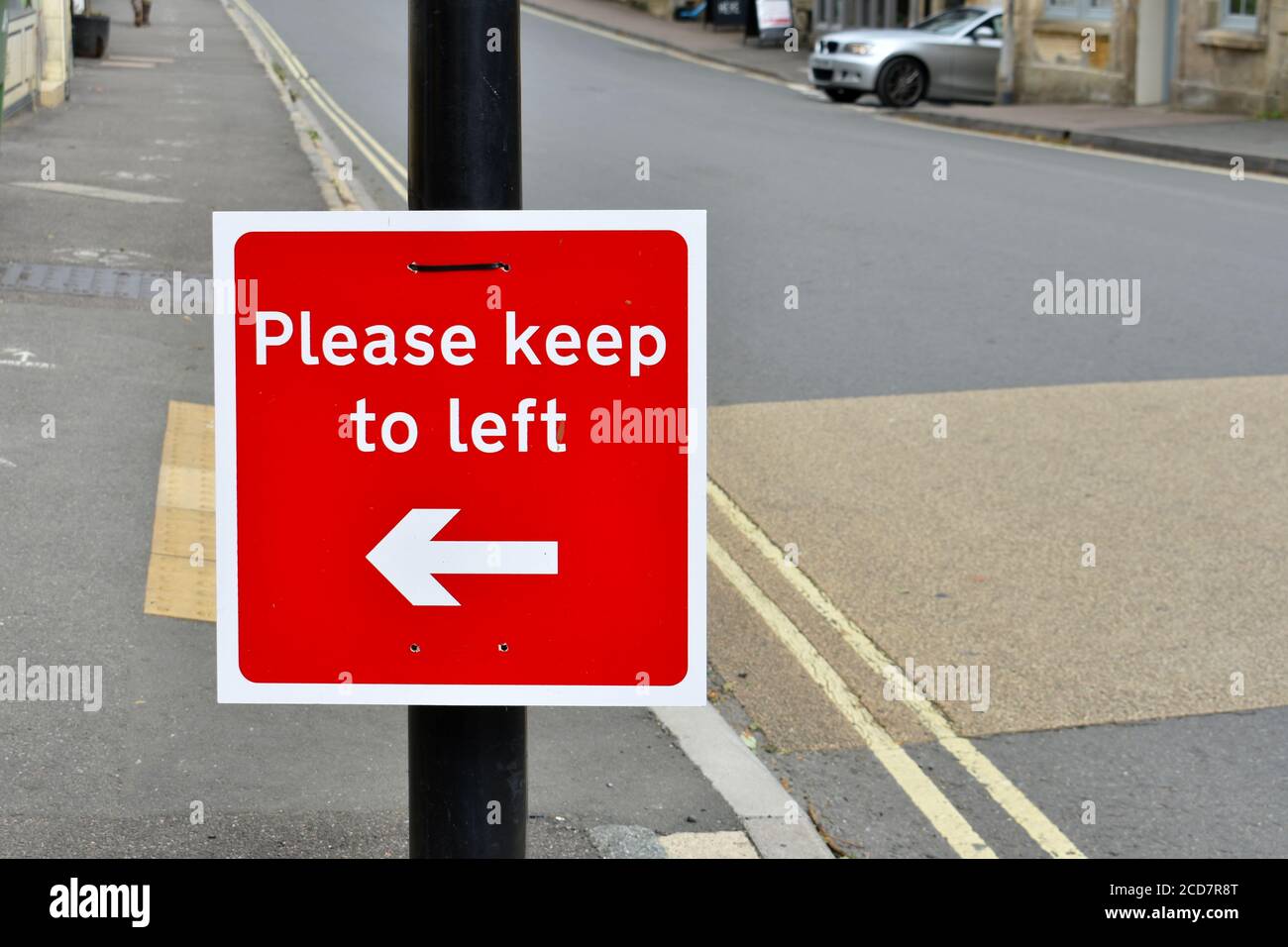 Keep left arrow red sign hi-res stock photography and images - Alamy