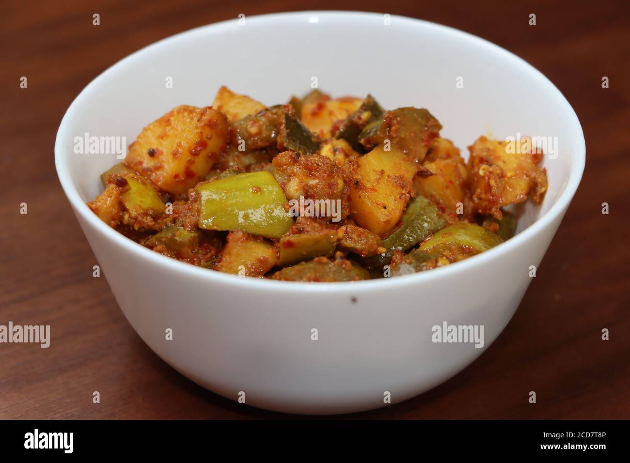 Achari Aloo Parwal Subji, Indian curry made with potatoes and pointed ...