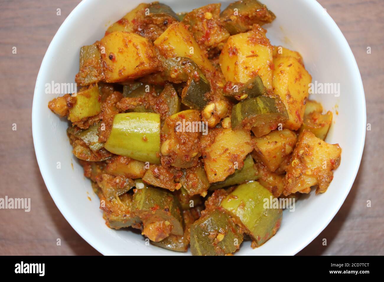 Achari Aloo Parwal Subji, Indian curry made with potatoes and pointed ...