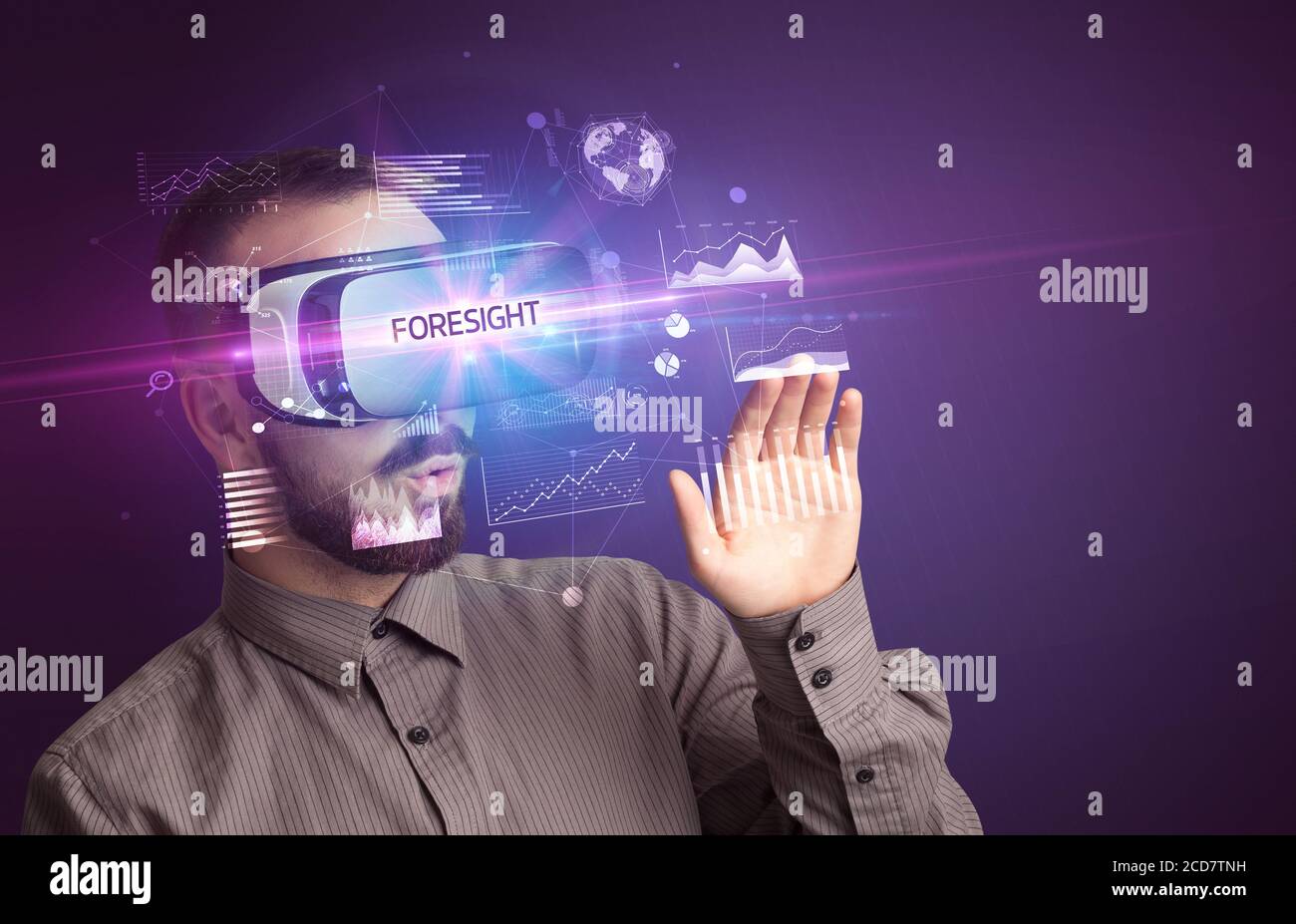 Businessman looking through Virtual Reality glasses with FORESIGHT ...