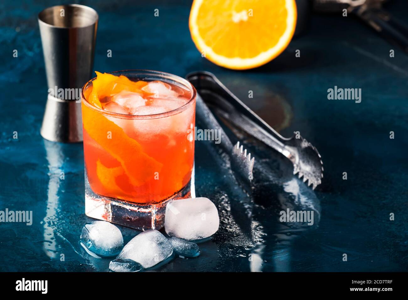 Orange Alcohol cocktail with red vermouth, bitter, soda, orange zest ...