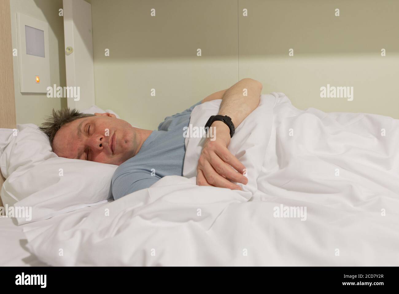 Man sleeping on berth in a cabin of a cruise ship Stock Photo - Alamy