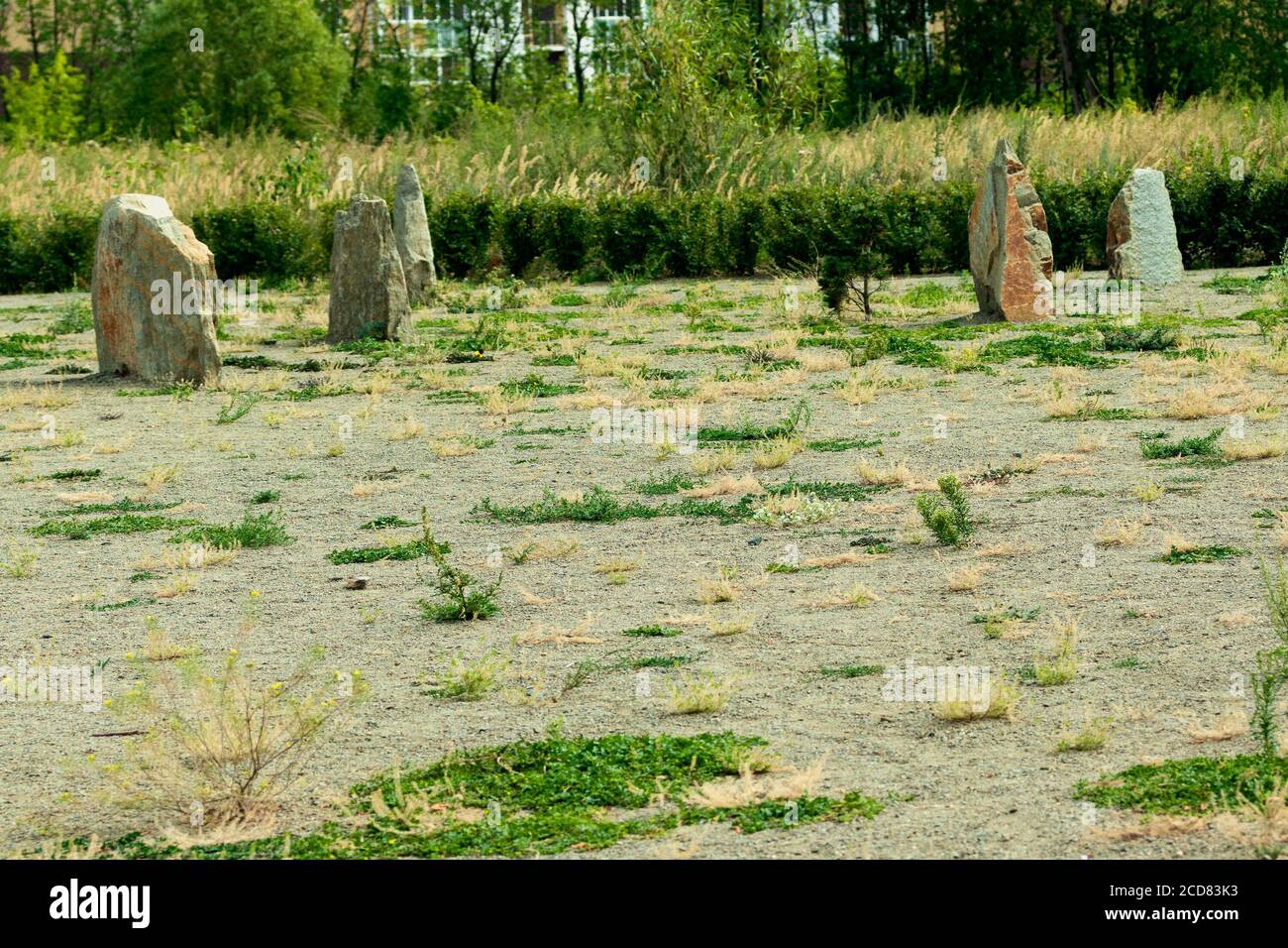 Tall stones standing close to each other Stock Photo - Alamy