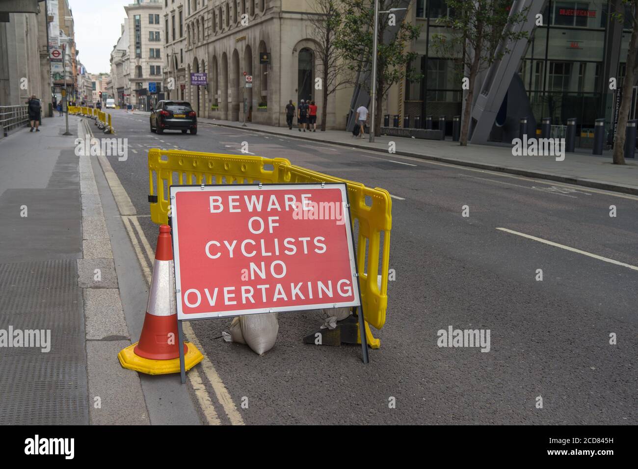 Beware of cyclists no overtaking sign. Focus on sign. London Stock ...