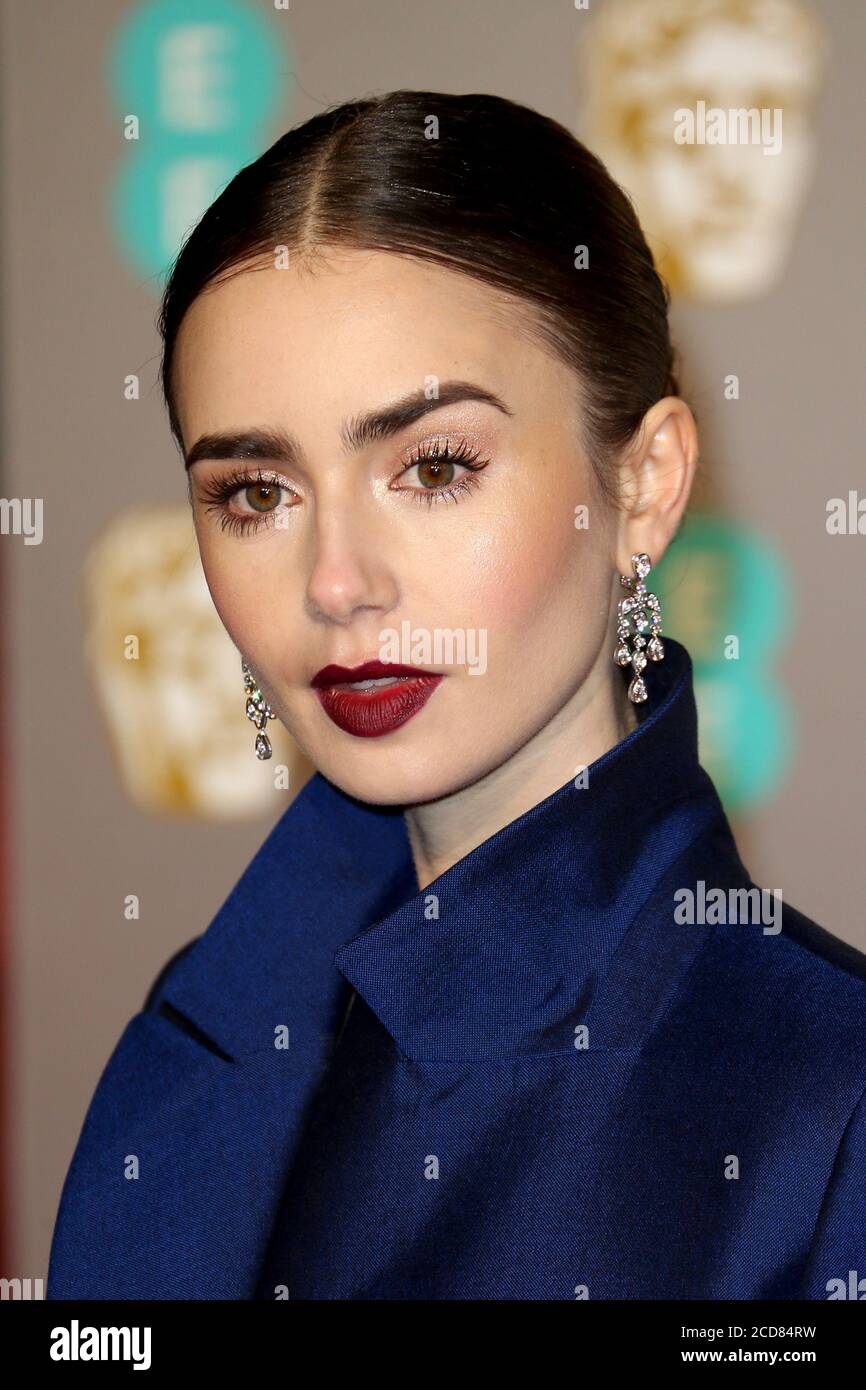 Lily Collins attends the EE British Academy Film Awards at Royal Albert ...