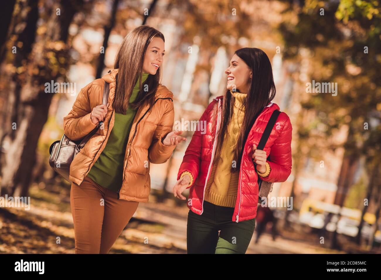 photo of two beautiful pretty joyful nice glad positive friends having ...