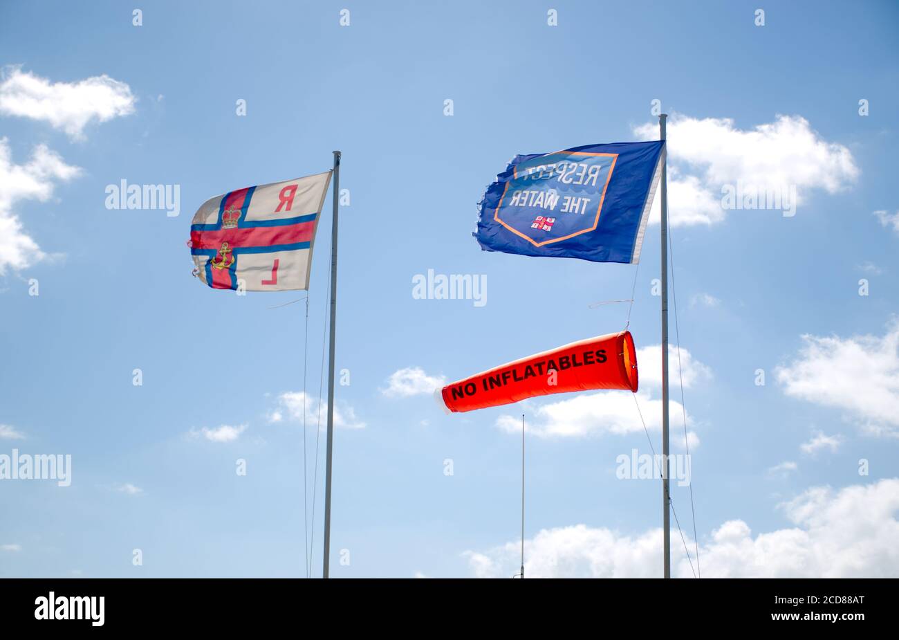 A RNLI, "No Inflatables", and "Respect the water" flags flying in the ...