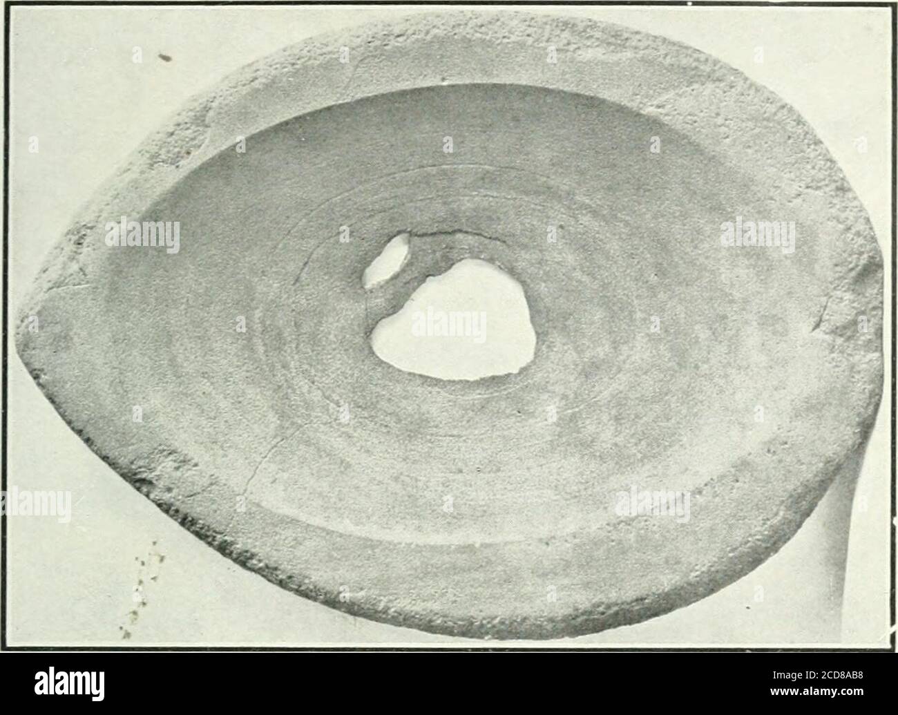 Grinding stone tribe hi-res stock photography and images - Alamy