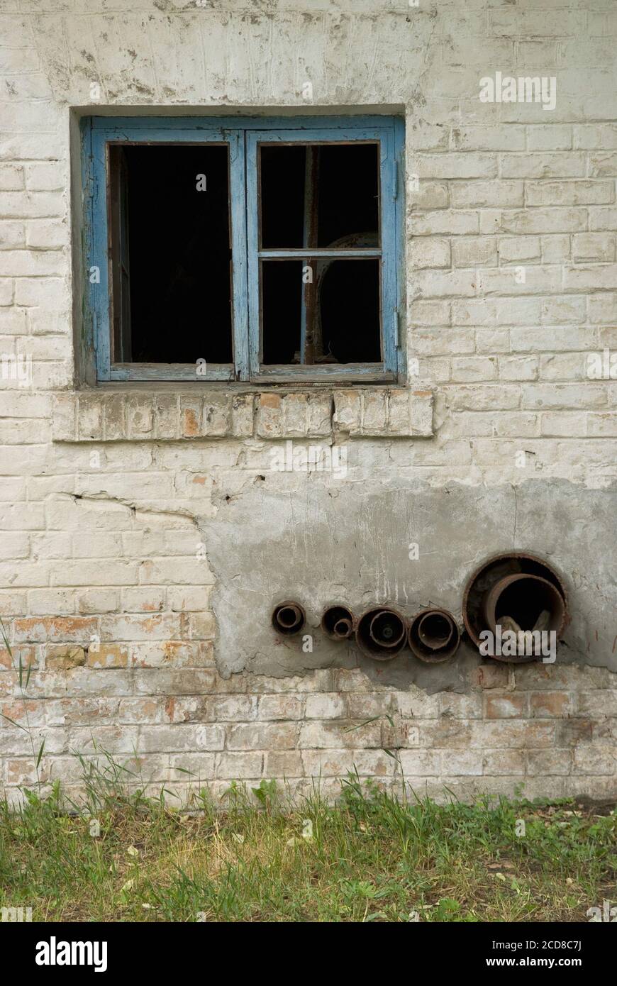 Wall of a workstation with holes drain pipes in the Chernobyl nuclear ...