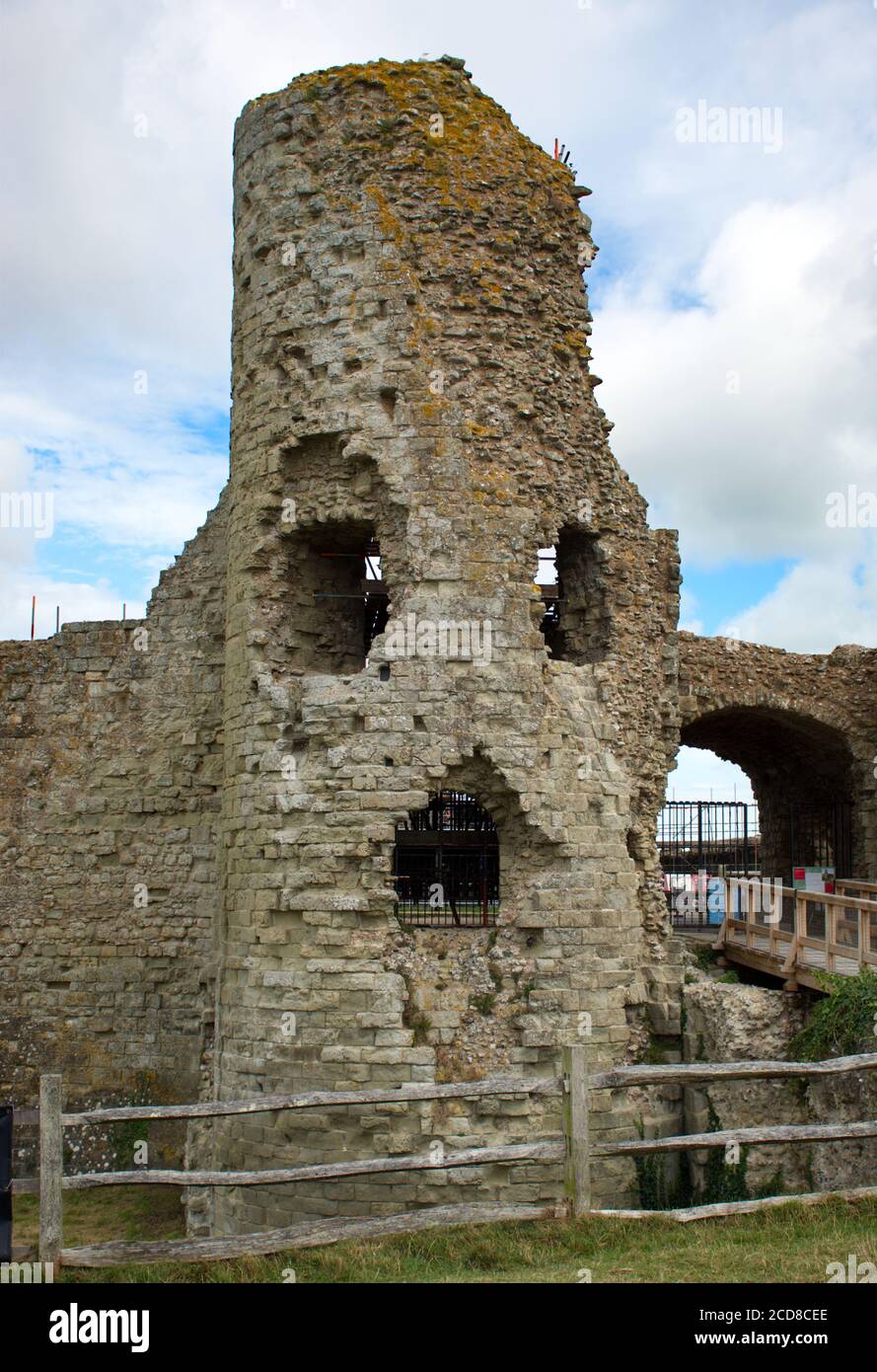 A view of Pevensey Castle, a Norman stone castle ruin built on the site ...