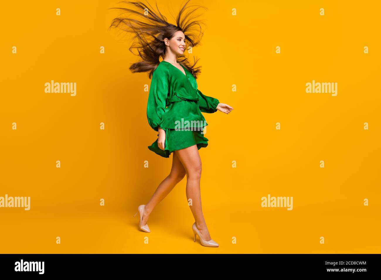 Woman elegant walking dress legs hi-res stock photography and images ...