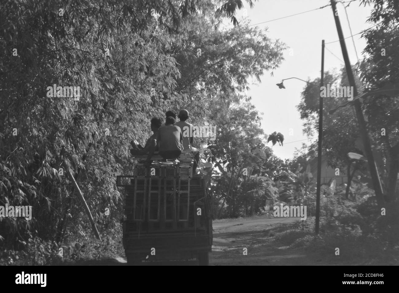 BLORA, INDONESIA - Aug 02, 2020: full passengers in a pick up car ...