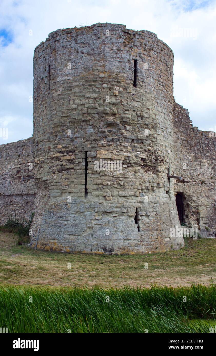 A view of Pevensey Castle, a Norman stone castle ruin built on the site ...