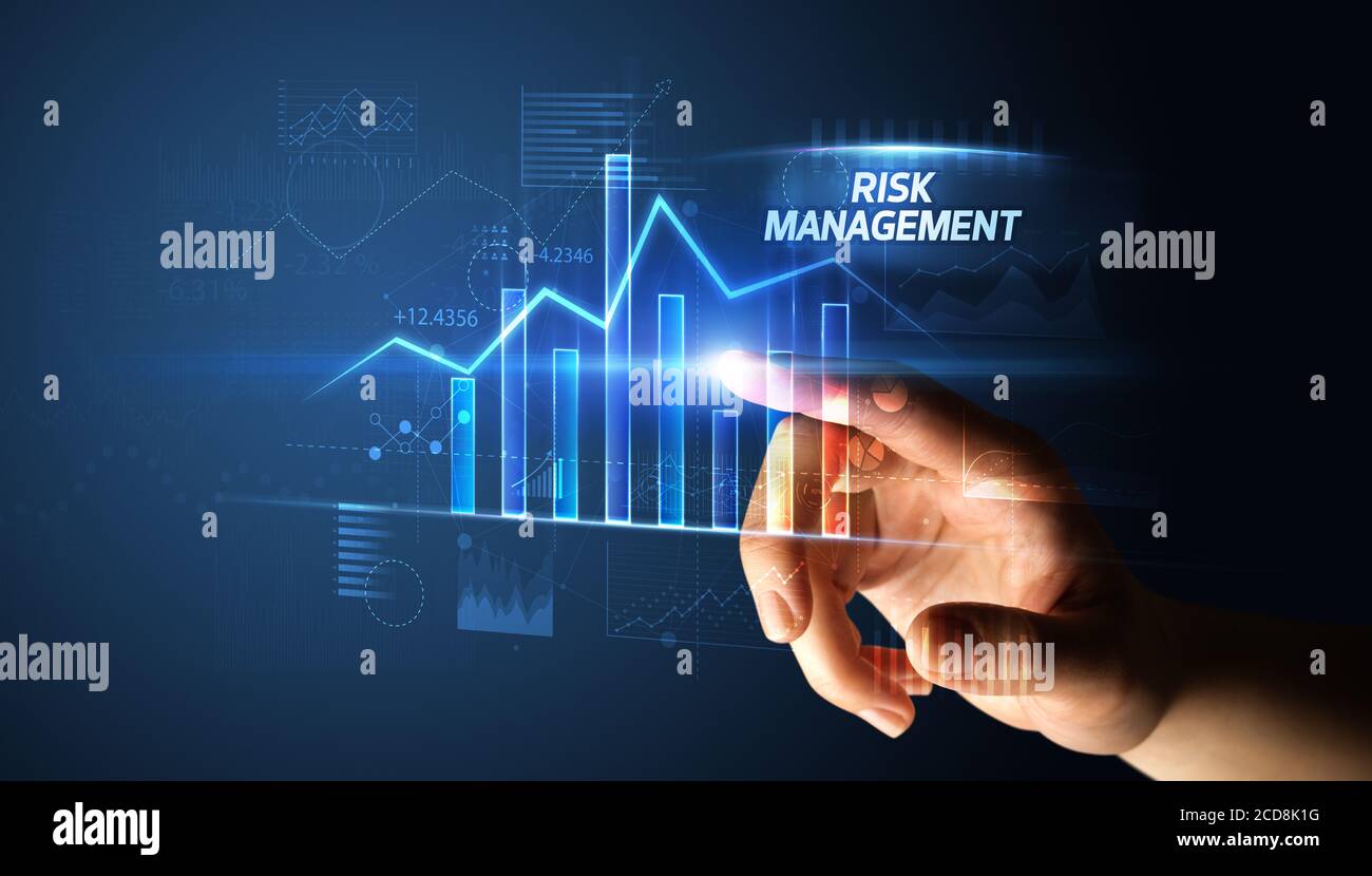 Hand touching RISK MANAGEMENT button, business concept Stock Photo - Alamy
