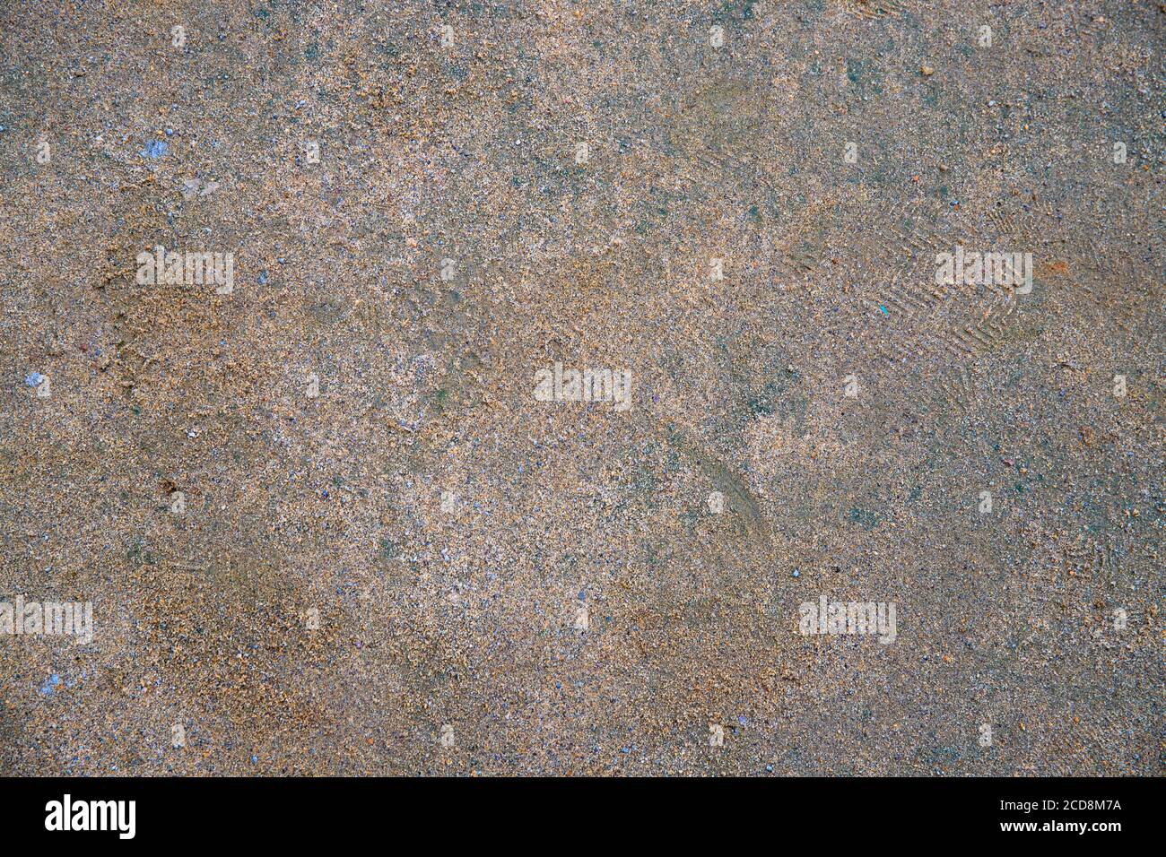 Sand and dirt on road surface. Dirty road texture. Grainy sand with ...