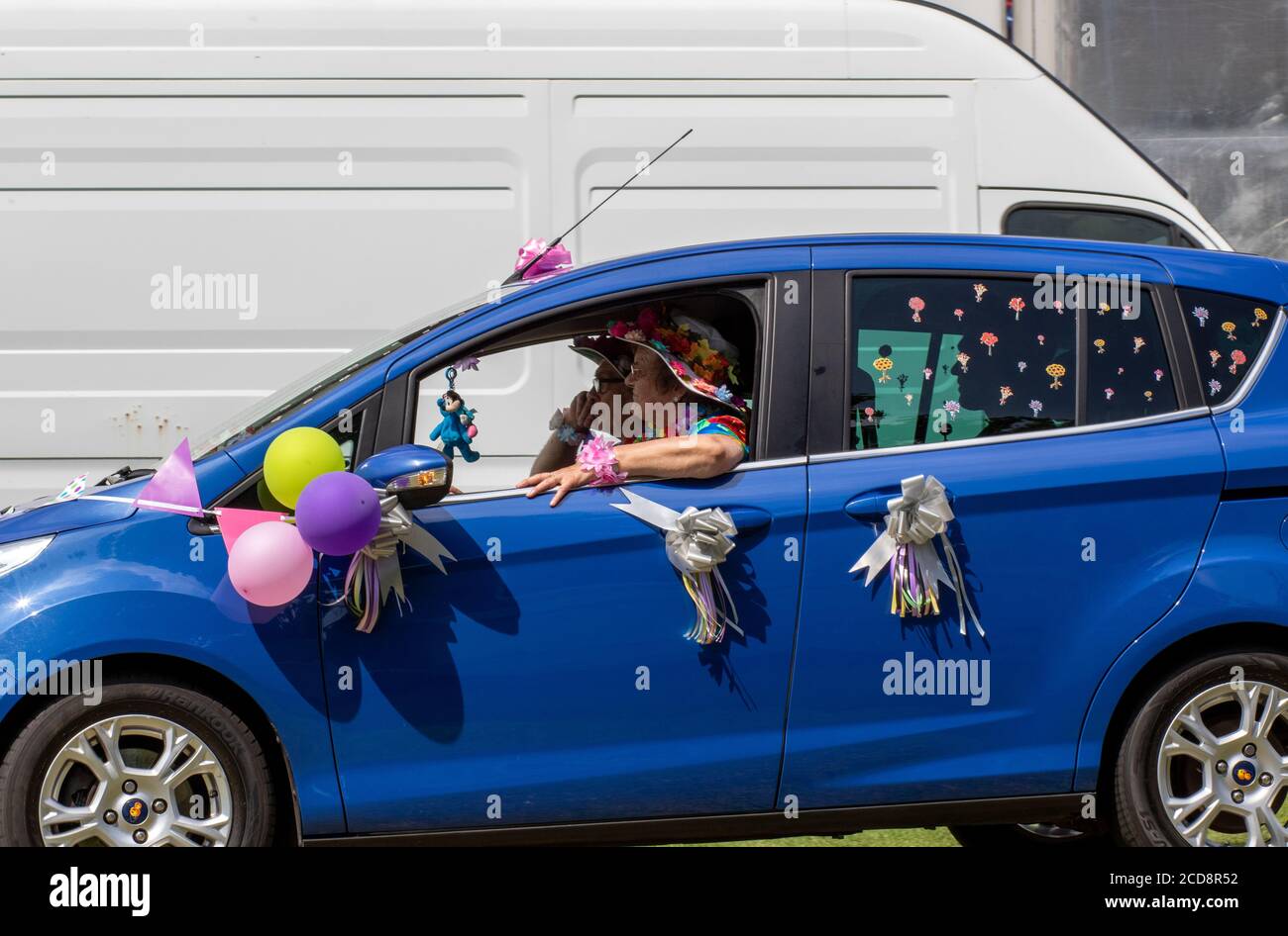 Car decorated for a parade with ribbons, bows and ballonms Stock Photo ...