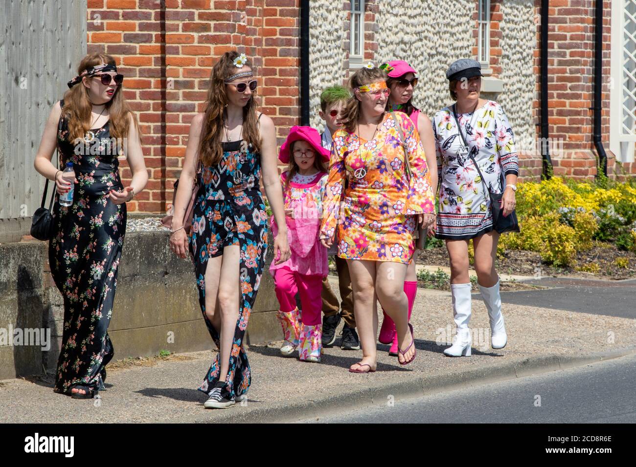 Women dressed in 1960s 'flower power' style for a parade Stock Photo ...