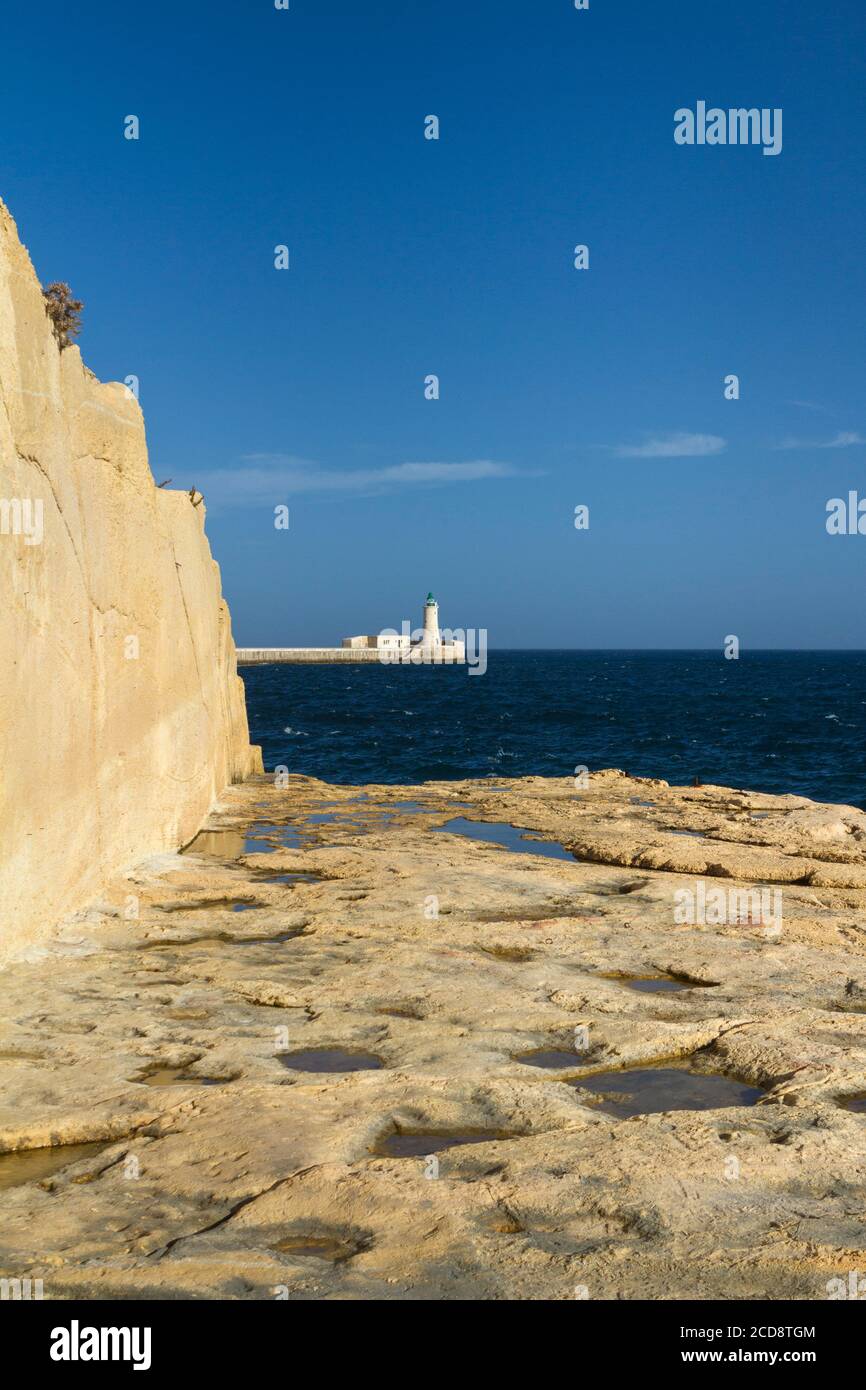 View on Valletta Grand Harbour (Port of Valletta) with rocks and ...