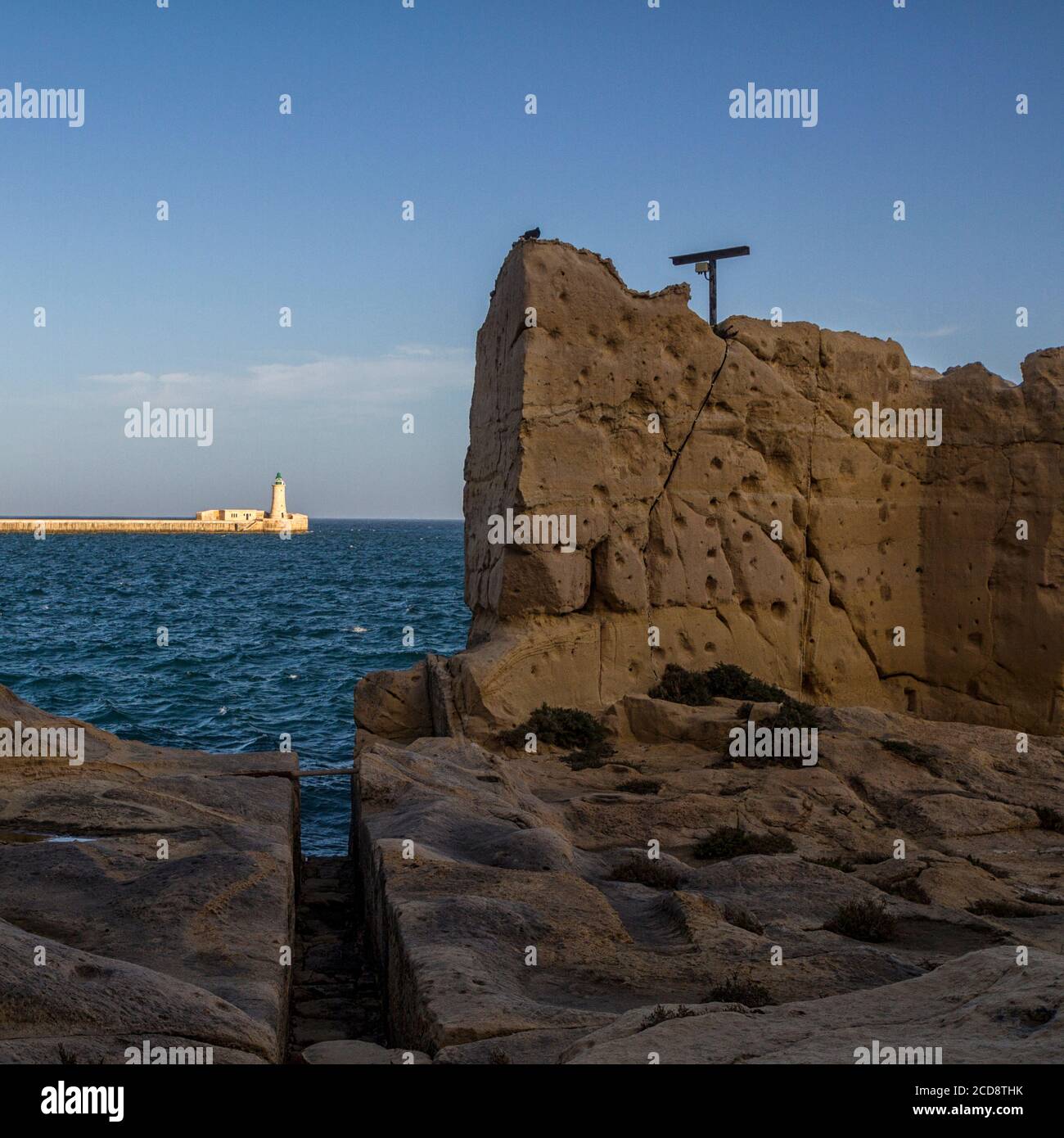 View on Valletta Grand Harbour (Port of Valletta) with rocks and ...